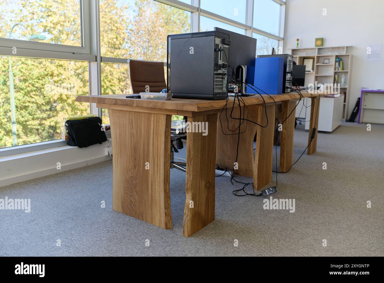 Modern Office Interior with Wooden Furniture, Conference Table, and ...