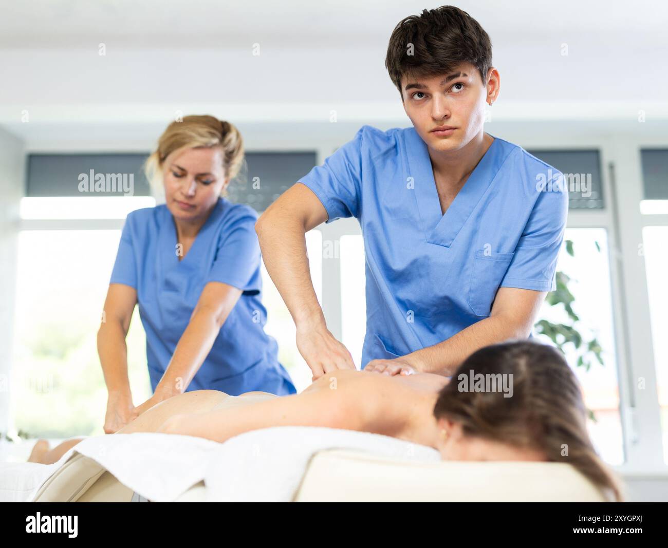 Female masseuse doing professional therapeutic hi-res stock photography and images - Alamy