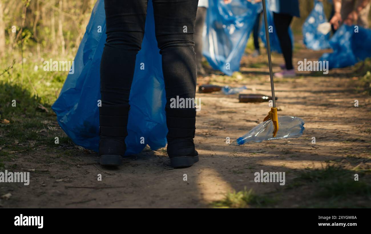 Volunteers gathering garbage in hi-res stock photography and images - Alamy