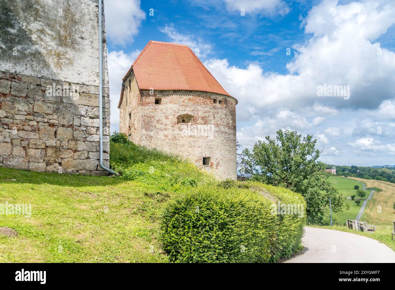 Round cannon gun tower with loopholes, red roof in Ptuj castle Slovenia ...