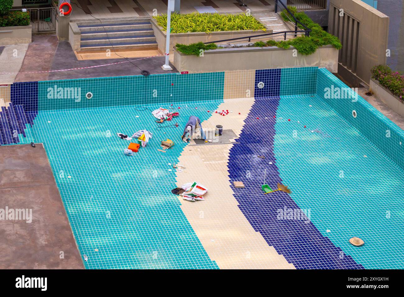 Person laying by the pool hi-res stock photography and images - Alamy