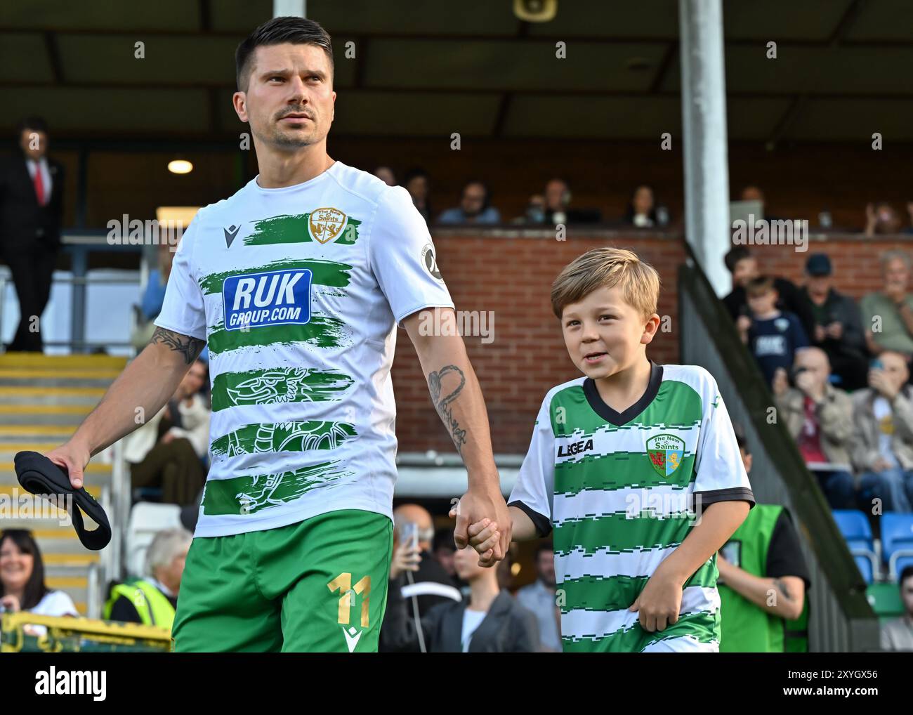Adrian Cieślewicz of The New Saints walks out ahead of the UEFA ...