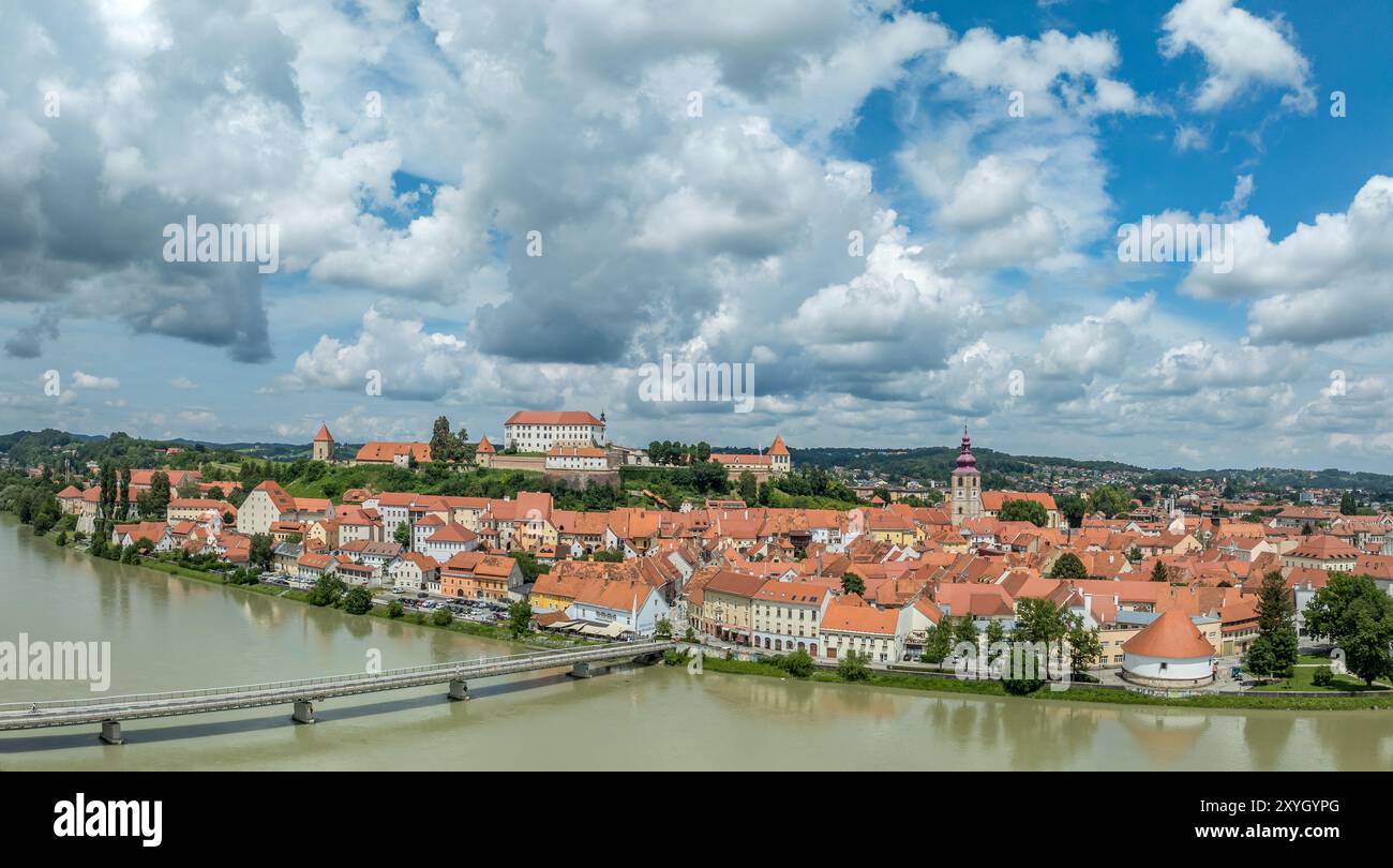 Aerial view of Ptuj, oldest Slovenian town along the Drava river with ...