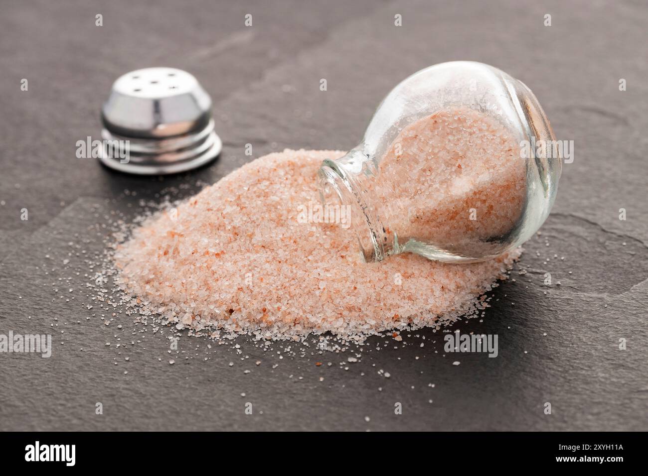 Salt shaker with fine grains of pink Himalayan salt Stock Photo - Alamy