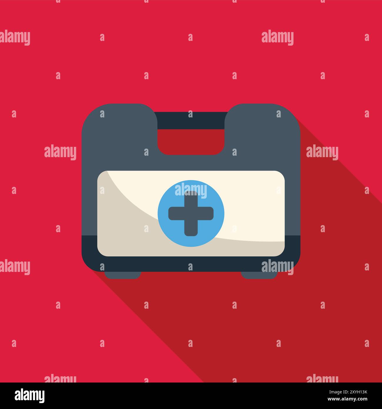 Closed first aid kit is lying flat on a red background, casting a long ...