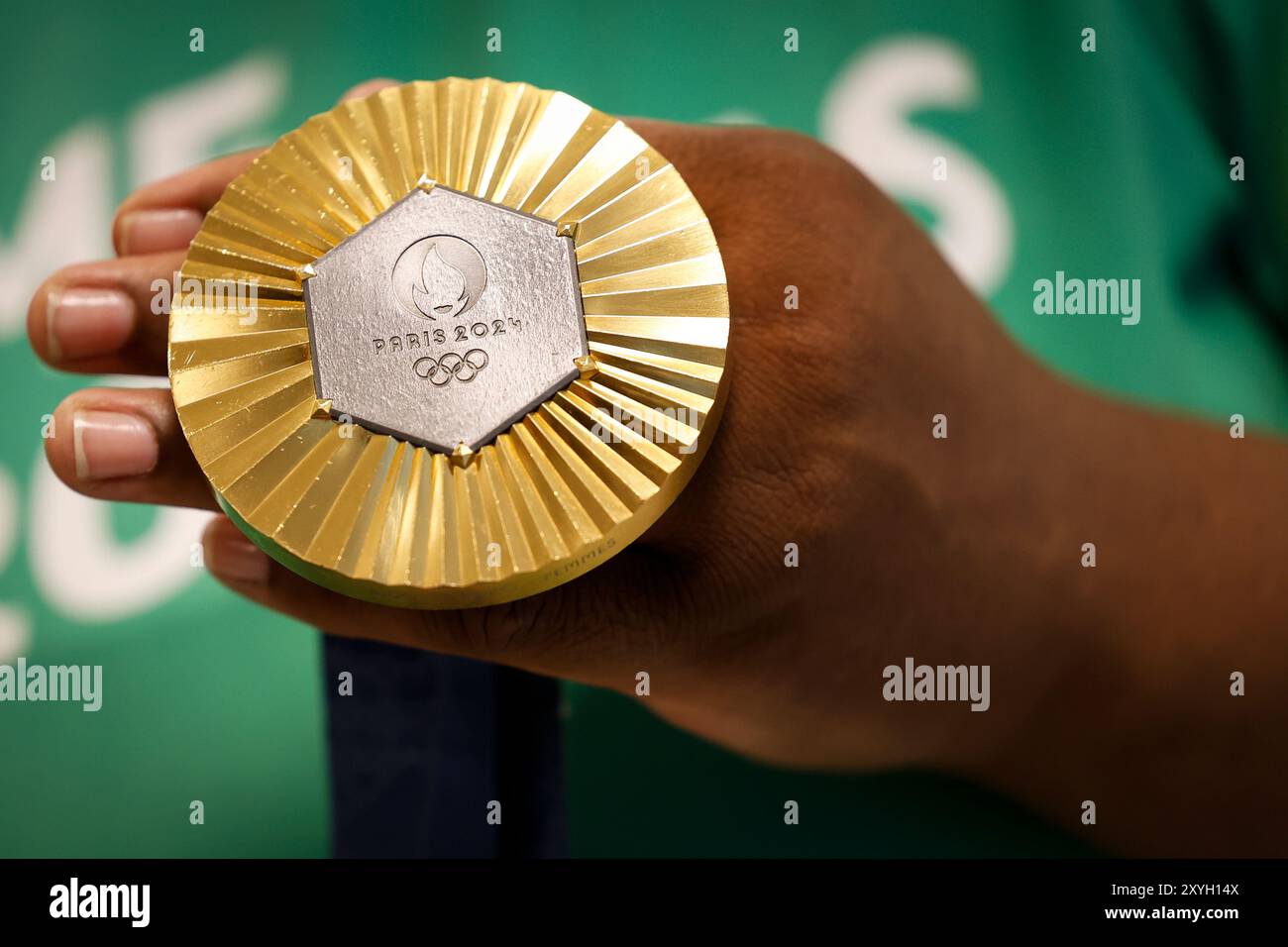 Gold medal of Paris 2024 Olympic Games handheld detail shot, sports ...