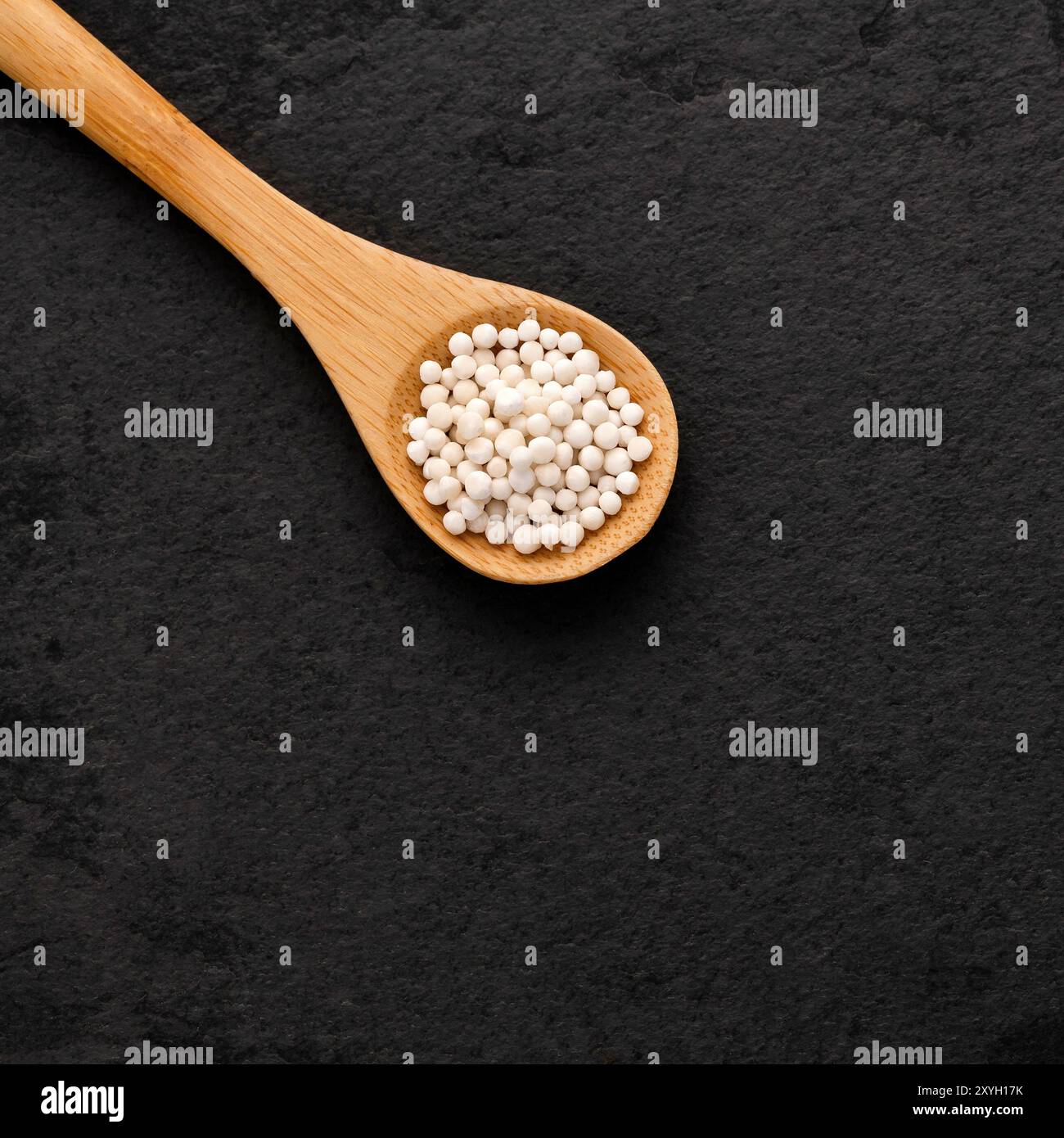 Starch tapioca pearls on the spoon - Manihot esculenta Stock Photo - Alamy
