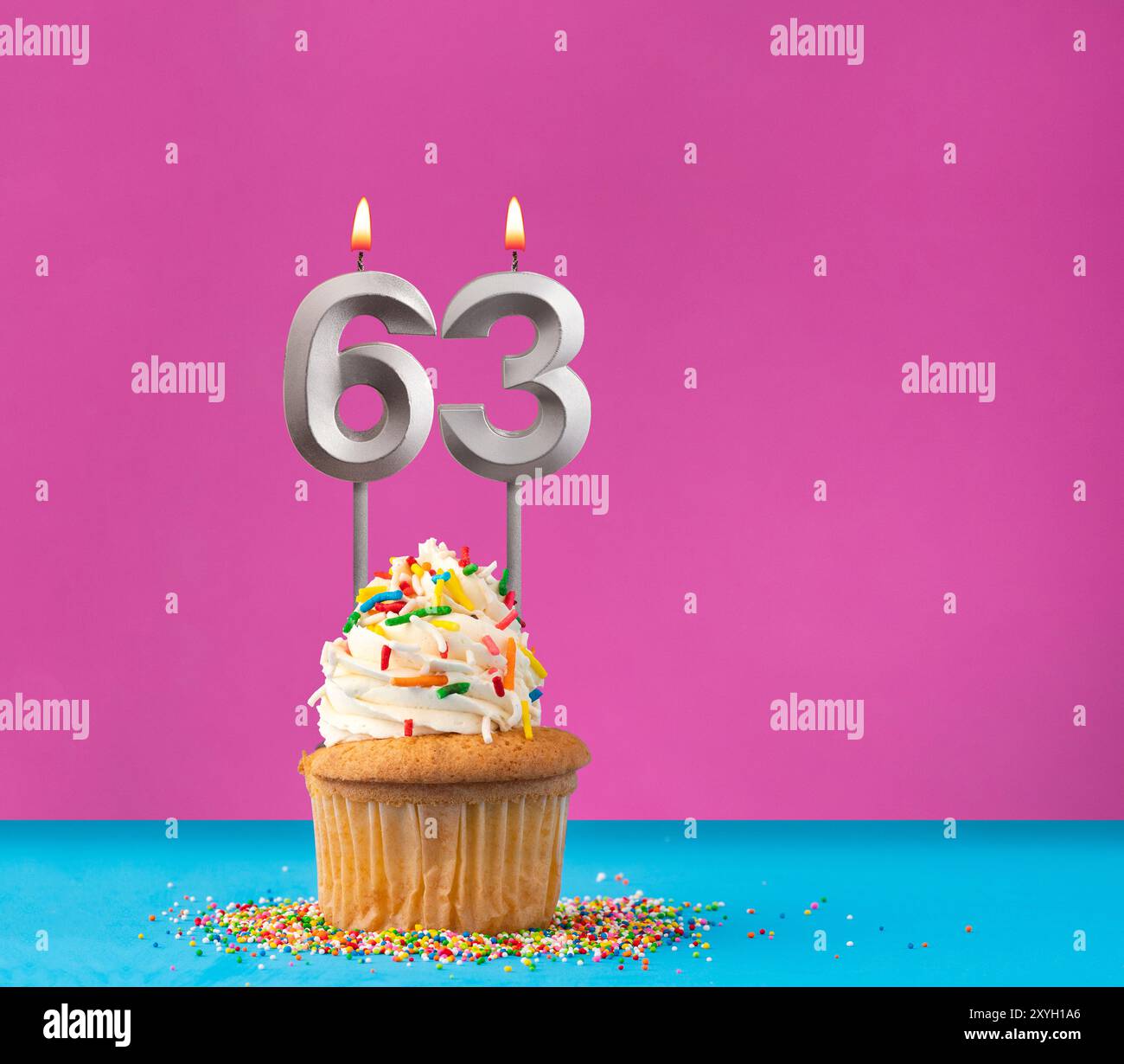 Cupcake with birthday candle number 63 - Anniversary card on blue and ...
