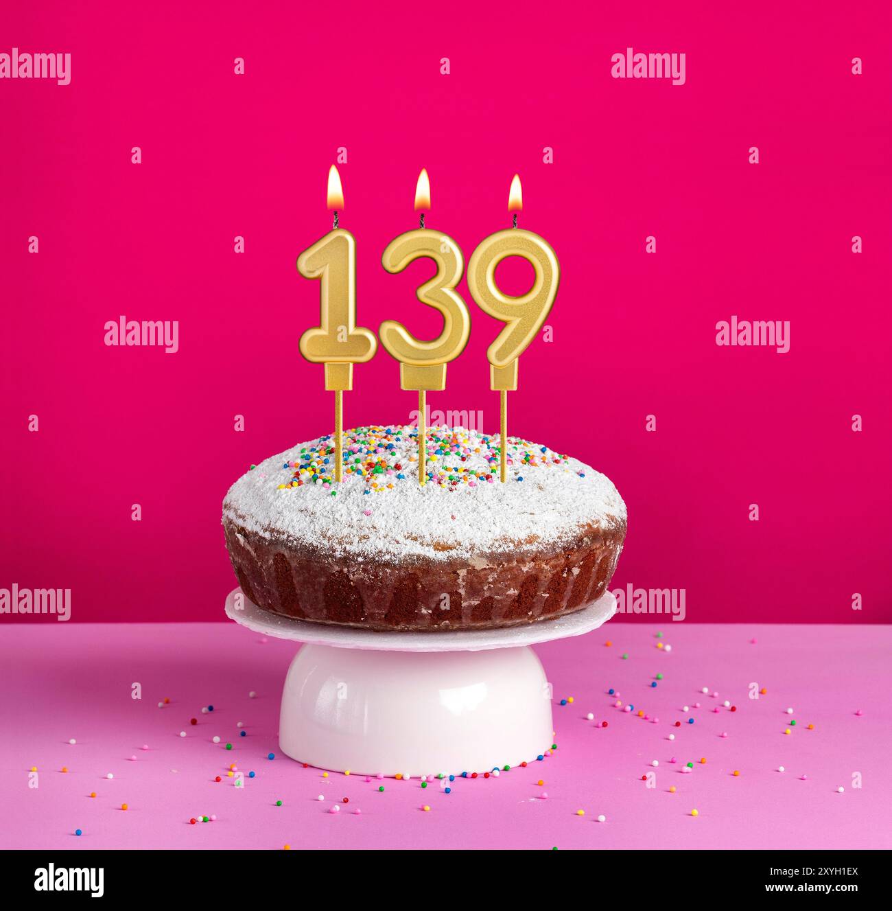 Birthday cake with number 139 candle on pink background Stock Photo - Alamy
