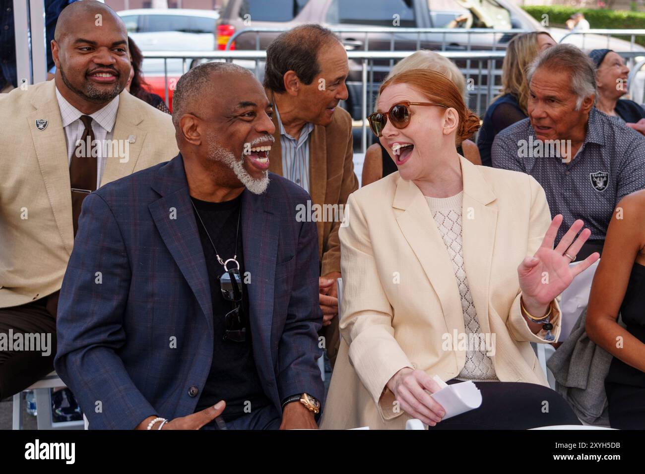 Actors directors LeVar Burton, left, and Bryce Dallas Howard laugh as ...