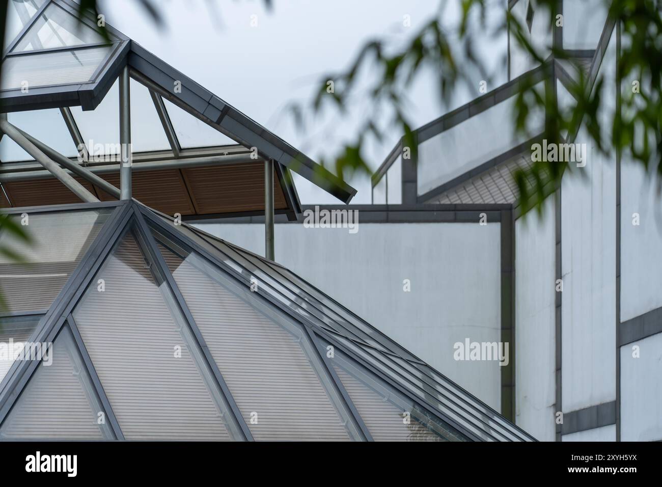 Suzhou, China - June 12, 2024 : A glass pyramid roof of a modern ...
