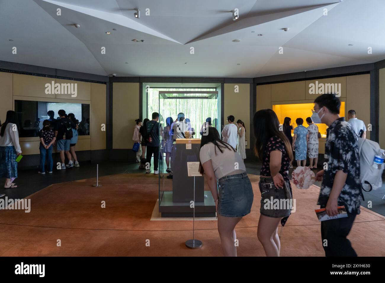 Suzhou, China - June 12, 2024 : A group of people visit a museum ...