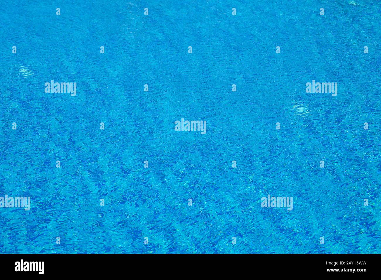 Abstract view of bottom caustics of swimming pool with ripple and flow ...