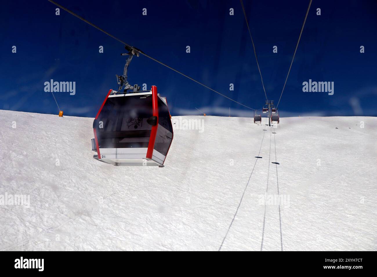 snow covered caucasus mountain and valley with cable car transportation ...