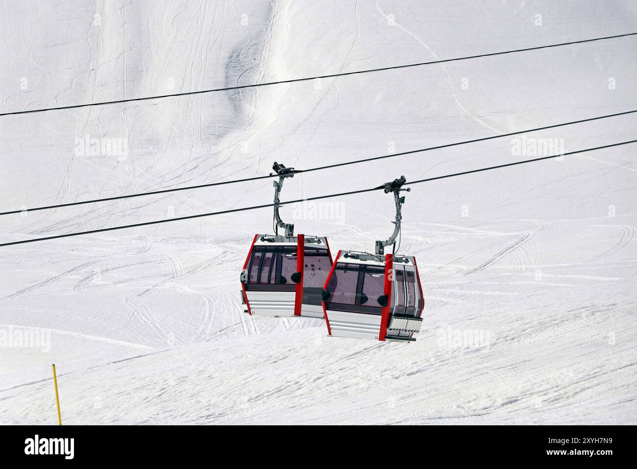 snow covered caucasus mountain and valley with cable car transportation ...