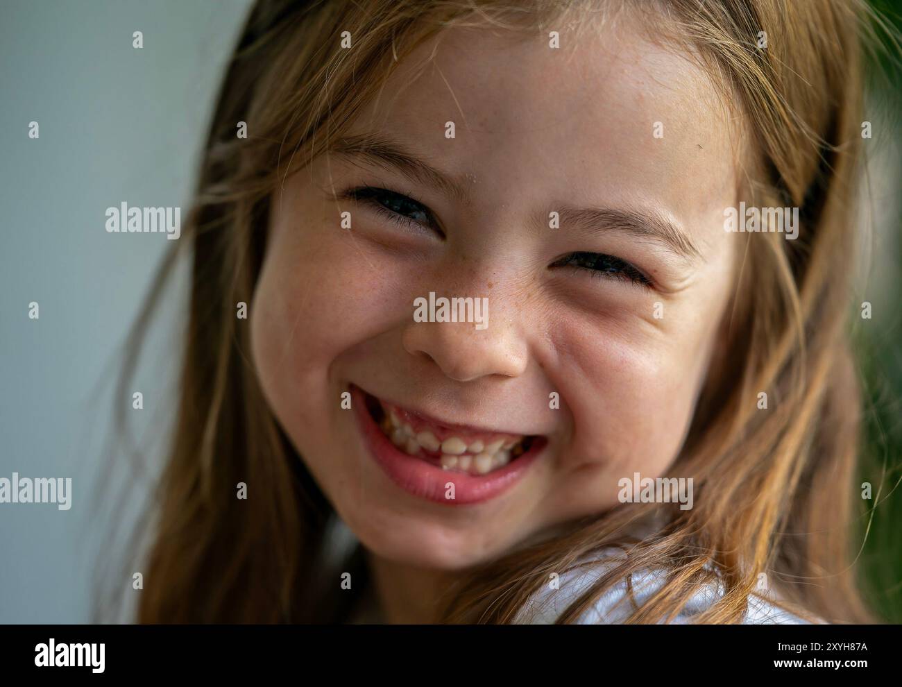 Lovely young girls become models over the kitchen table Stock Photo - Alamy