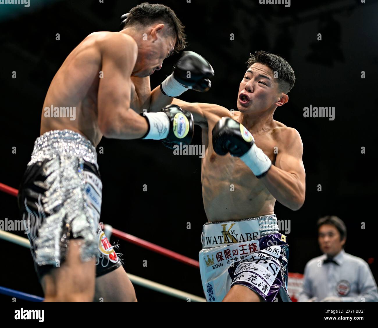 Tokyo, Japan. 22nd Aug, 2024. Japan's Kai Watanabe, right, hits Japan's Toshihiro Suzuki during ...