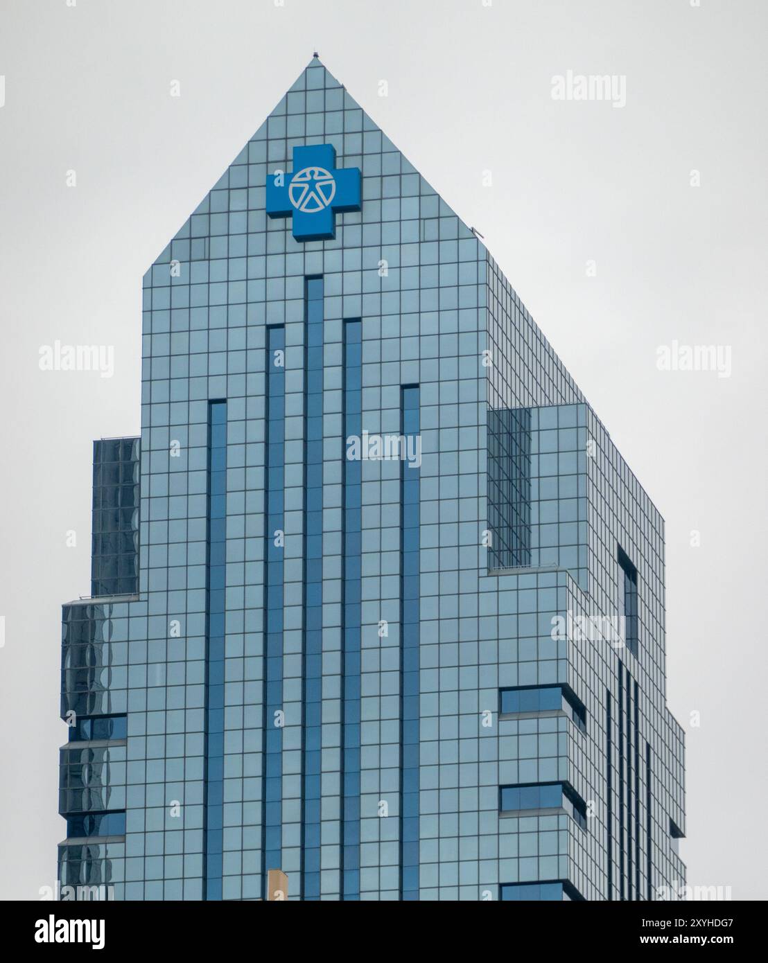Cross blue shield tower sign hi-res stock photography and images - Alamy