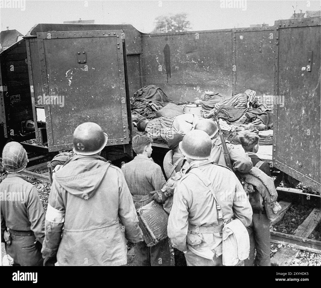 The Dachau death train consisted of nearly forty railcars containing ...