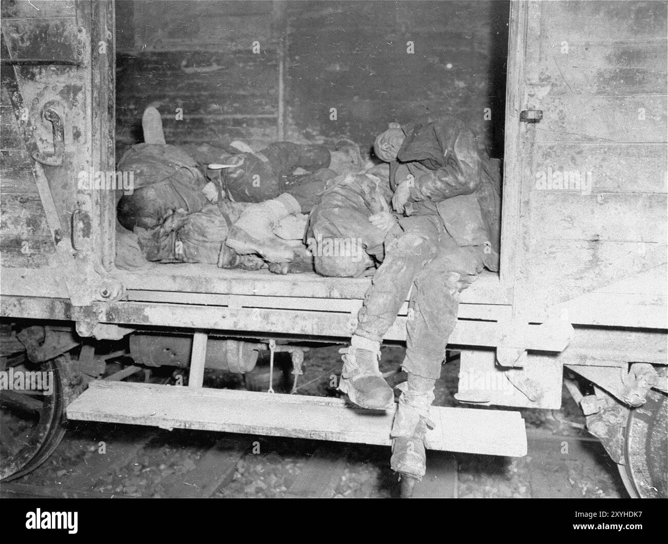The Dachau death train consisted of nearly forty railcars containing ...