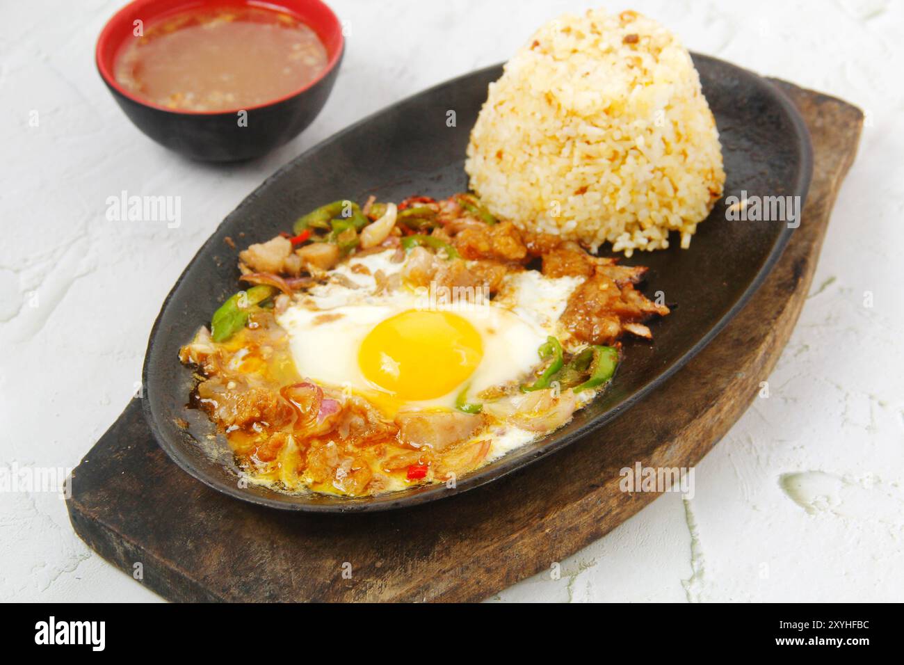 Photo of freshly cooked Filipino food called Sizzling Sisig or chopped ...