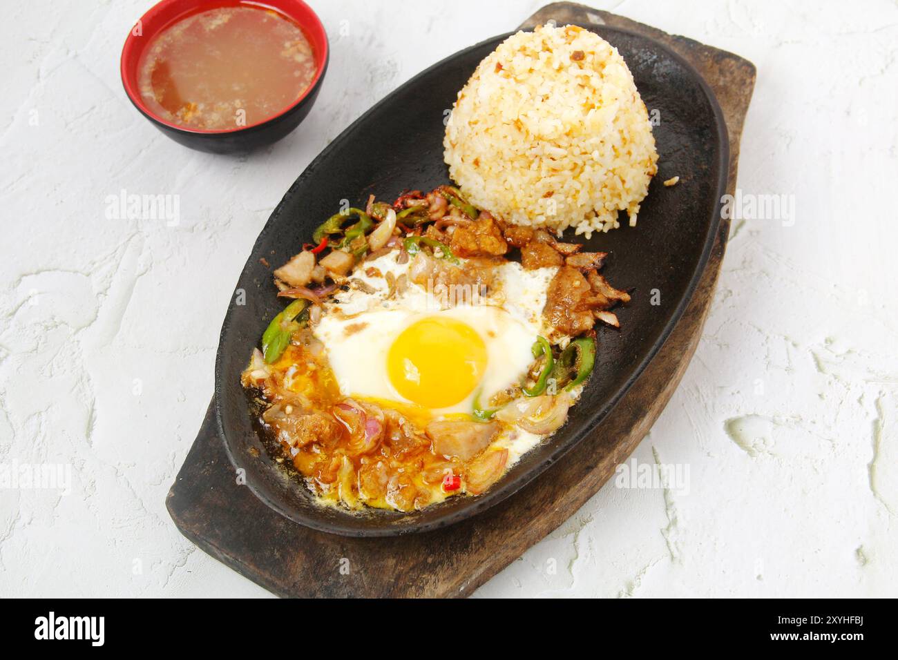 Photo of freshly cooked Filipino food called Sizzling Sisig or chopped ...