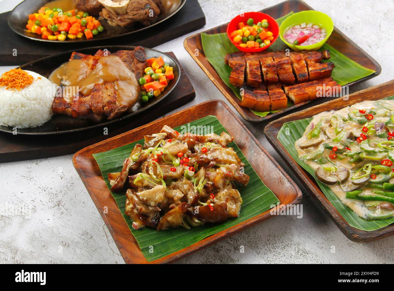 Photo of freshly cooked assorted Filipino food Stock Photo - Alamy