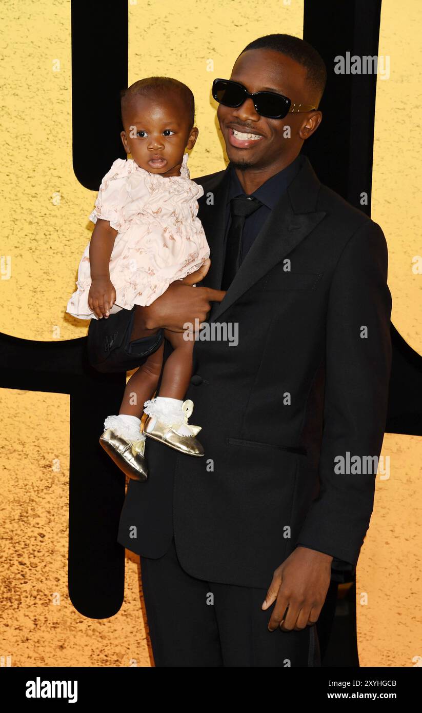 LOS ANGELES, CALIFORNIA - AUGUST 27: Christopher Ammanuel and child ...