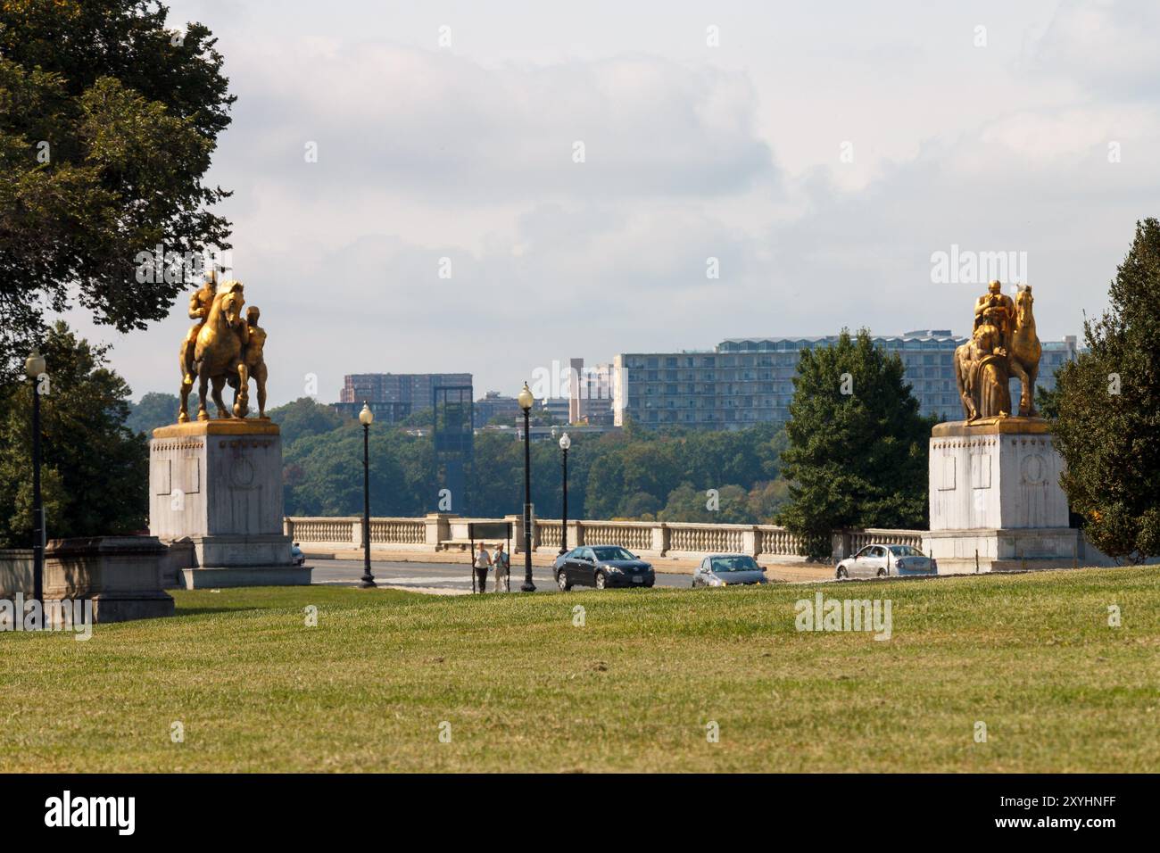 Two horseback riding golden sculptures in Arlington Memorial bridge ...