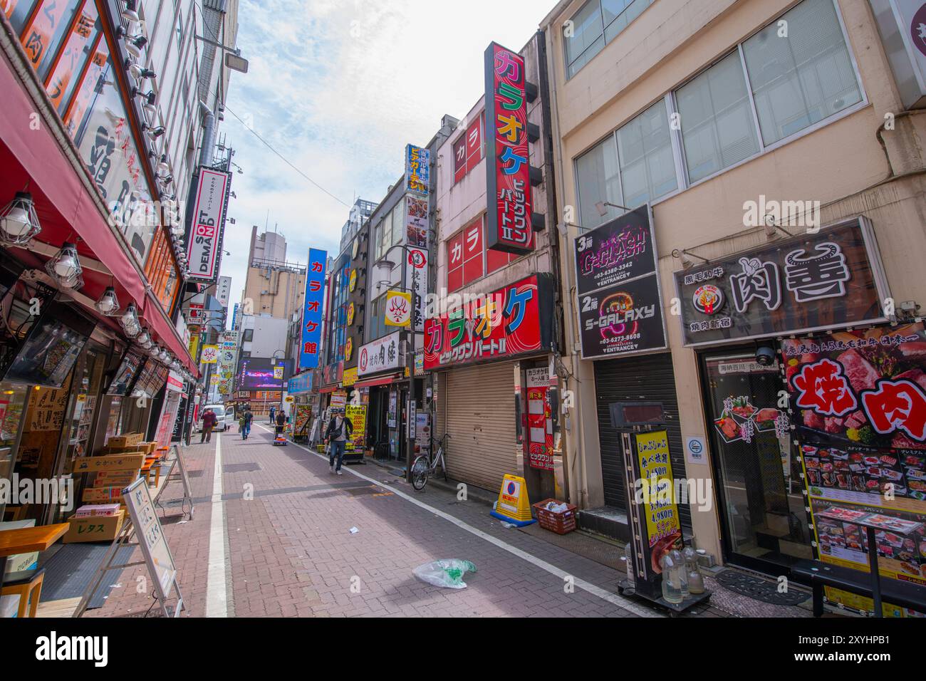 Shops and restaurants at night on Kabukicho Ichiban Gai Street in ...