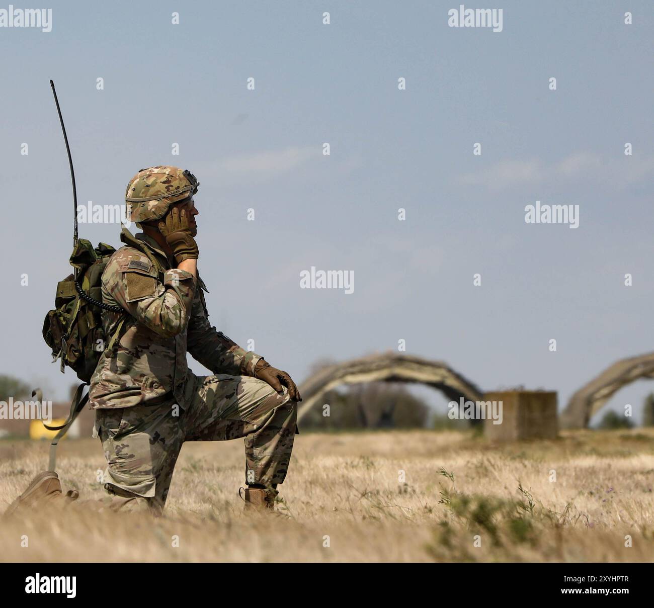 A U.S. Army Soldier assigned to the 10th Mountain Division uses a radio ...