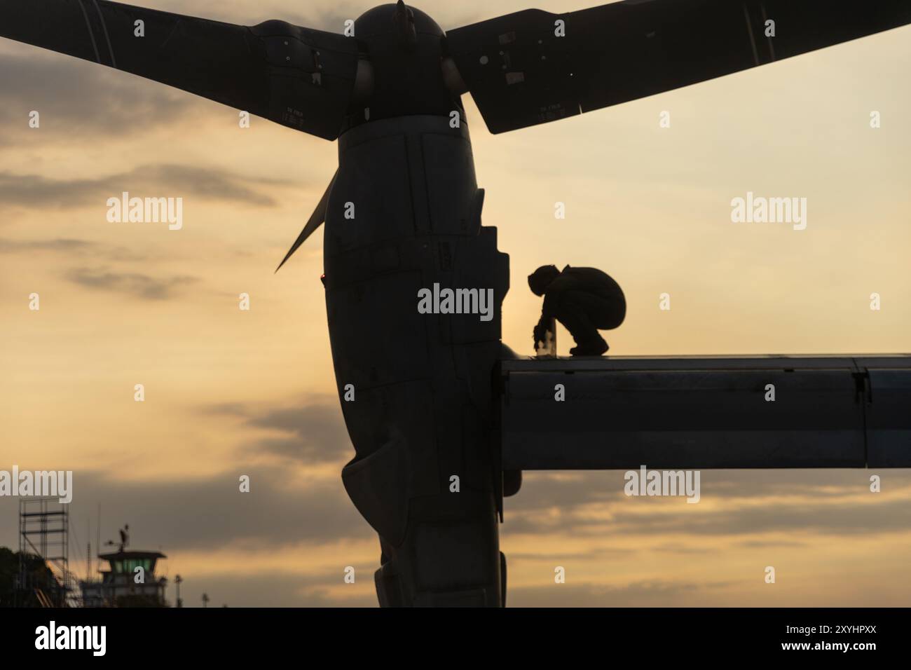 U.S. Marine Corps Cpl. Stephen Thomas, an MV-22B Osprey crew chief with ...