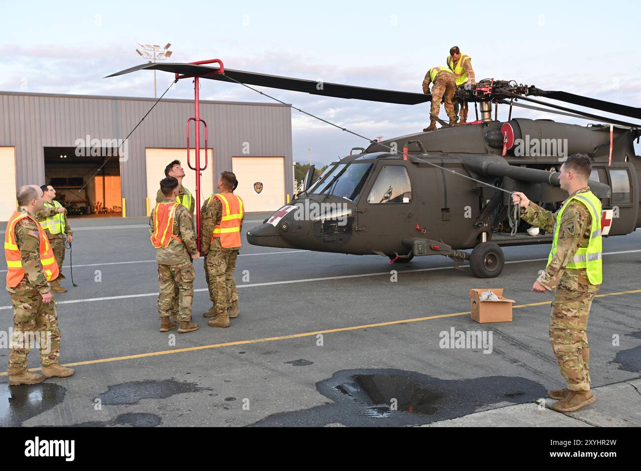 Soldiers from the 1st Battalion, 52nd Aviation Regiment return an HH-60 ...