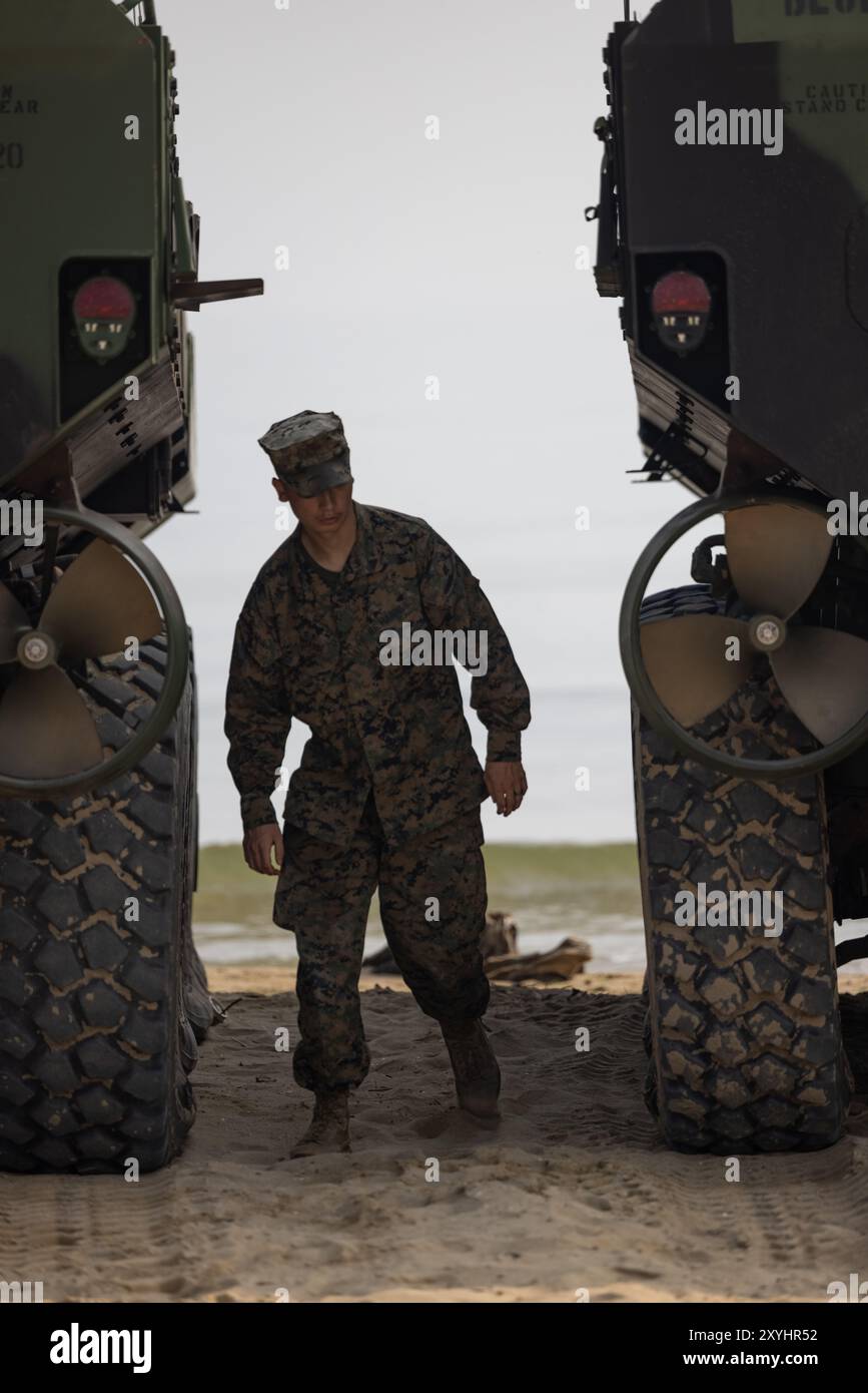 U.S. Marine Corps Cpl. Matthew Imsande, an assault amphibian crew ...
