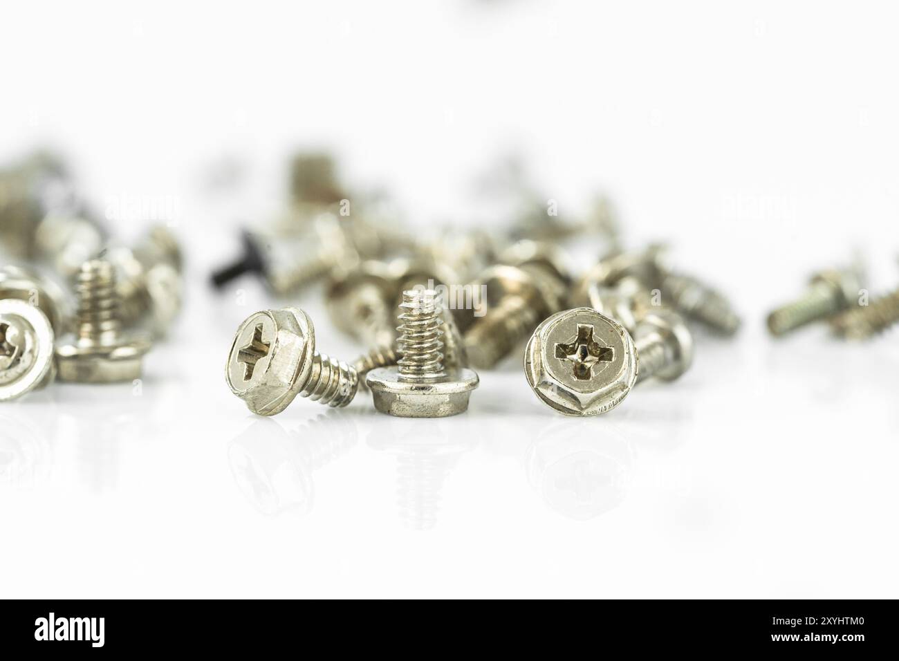 Close up set of old screws on the white background Stock Photo - Alamy