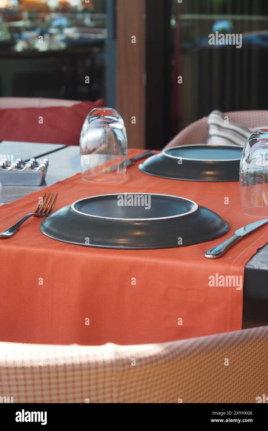 An Elegant Restaurant Table Setting Featuring Beautiful and Stylish ...