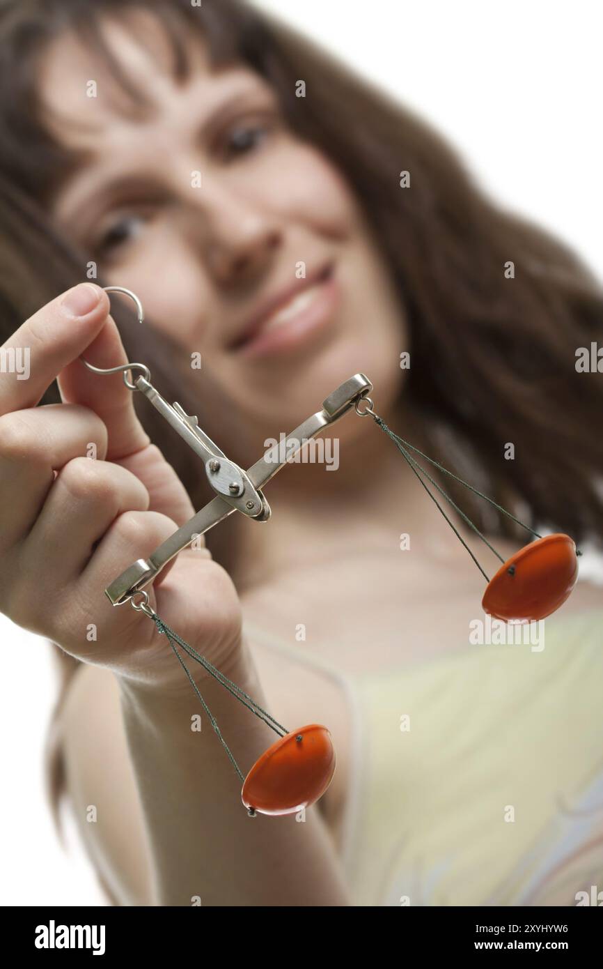 Women hand holding balance measuring weight scale Stock Photo - Alamy