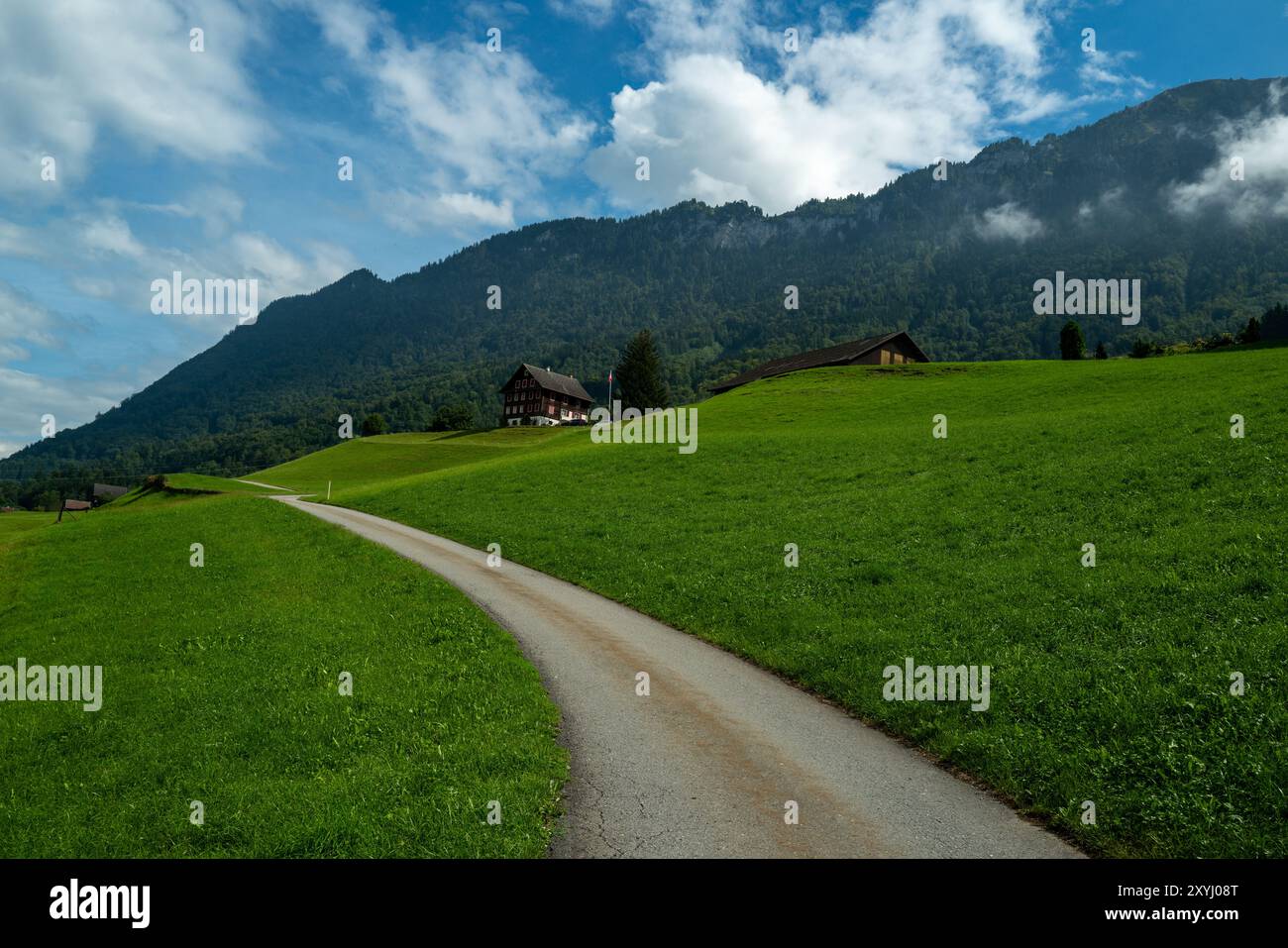 Road trip. Road passing through mountains in Alps. Swiss mountain ...