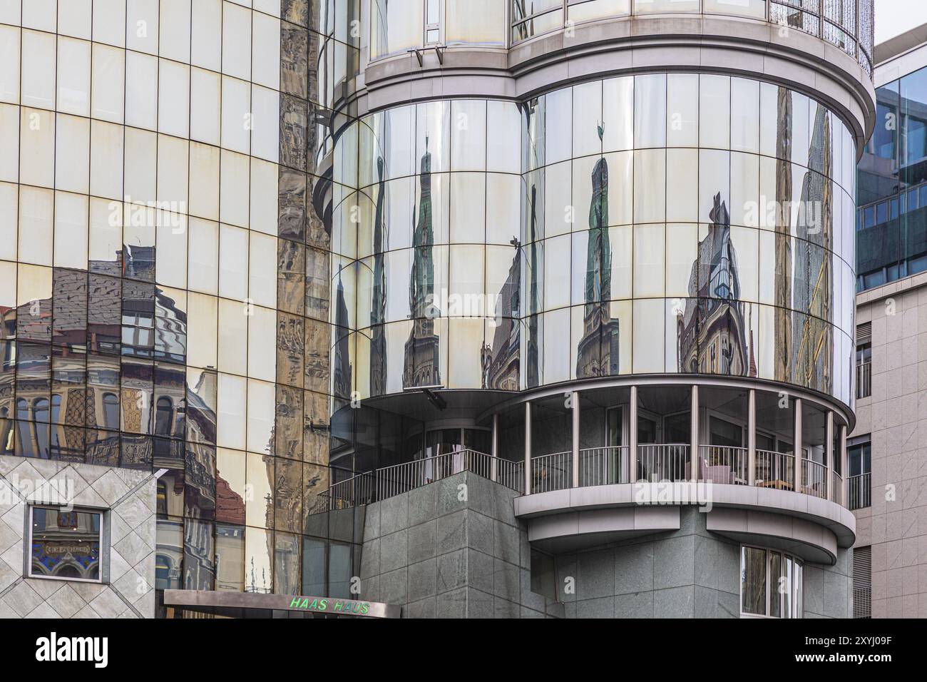 Reflections on the glass facade of the Haas Haus on Stephans-Platz ...