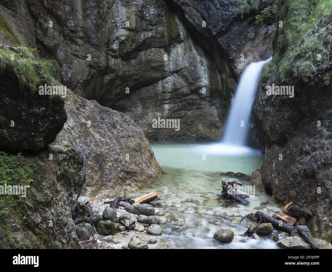 A waterfall of the Almbach stream in the Almbachklamm gorge Stock Photo ...