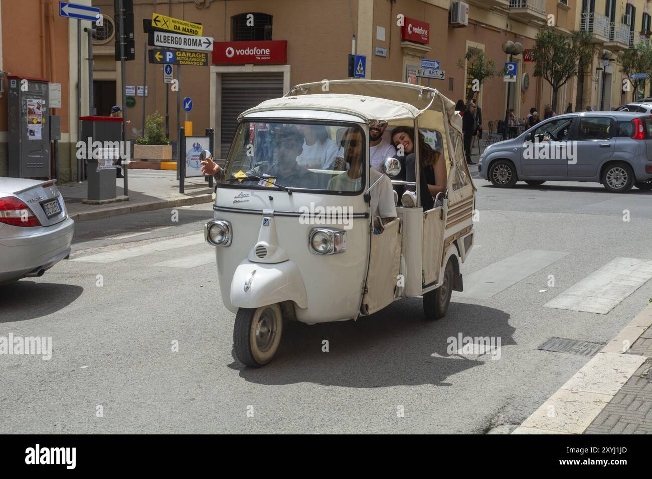 Three-wheeled scooter Ape by Piaggio in a street in Matera, Basilicata ...