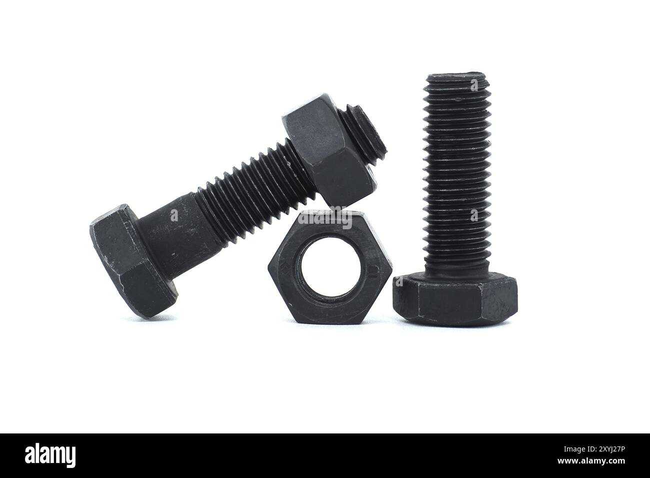 Black metal hexagonal bolts and nuts shown in close-up isolated on ...