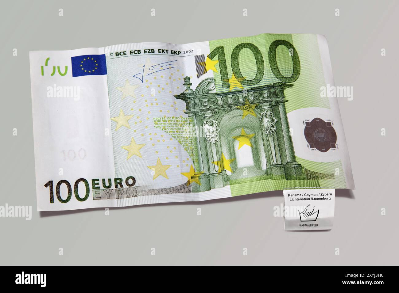 Euro banknote with washing instructions Stock Photo - Alamy