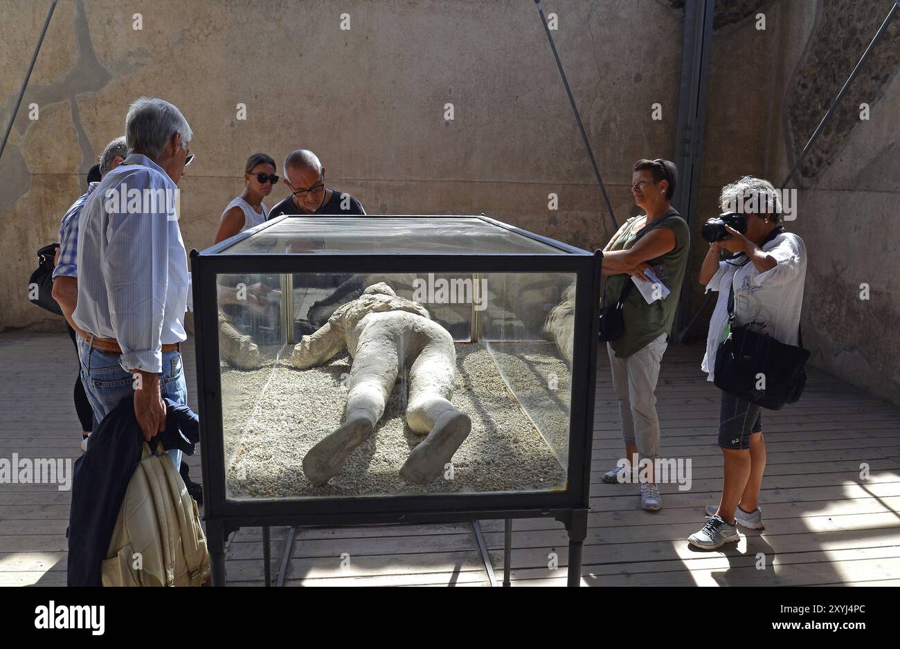 The tourists look at the cast of a victim in one room Stock Photo - Alamy