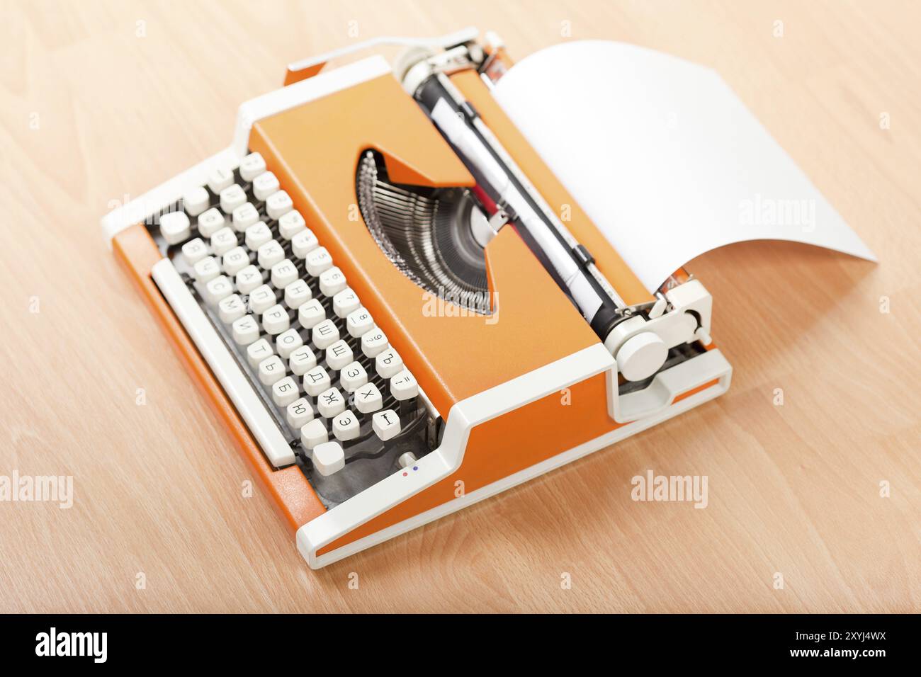 Typescript hand typing typewriter blank paper text Stock Photo - Alamy