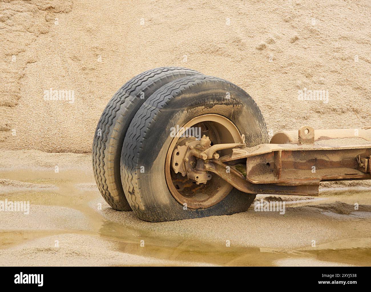 A wheel in a gravel pit Stock Photo - Alamy