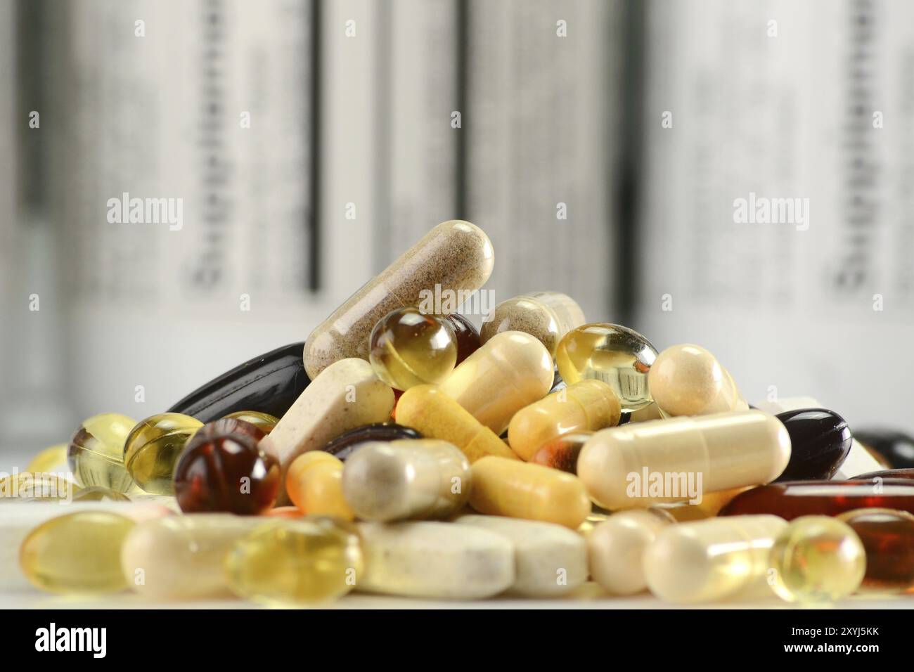 Composition with dietary supplement capsules and containers Stock Photo ...