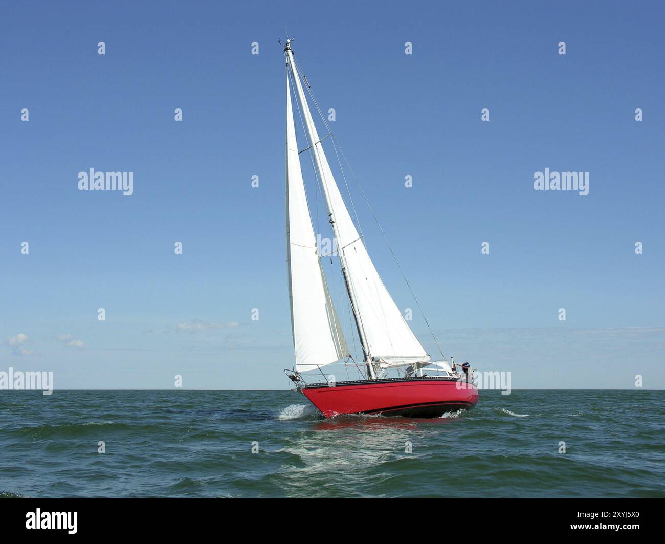 Red sailing yacht Stock Photo - Alamy