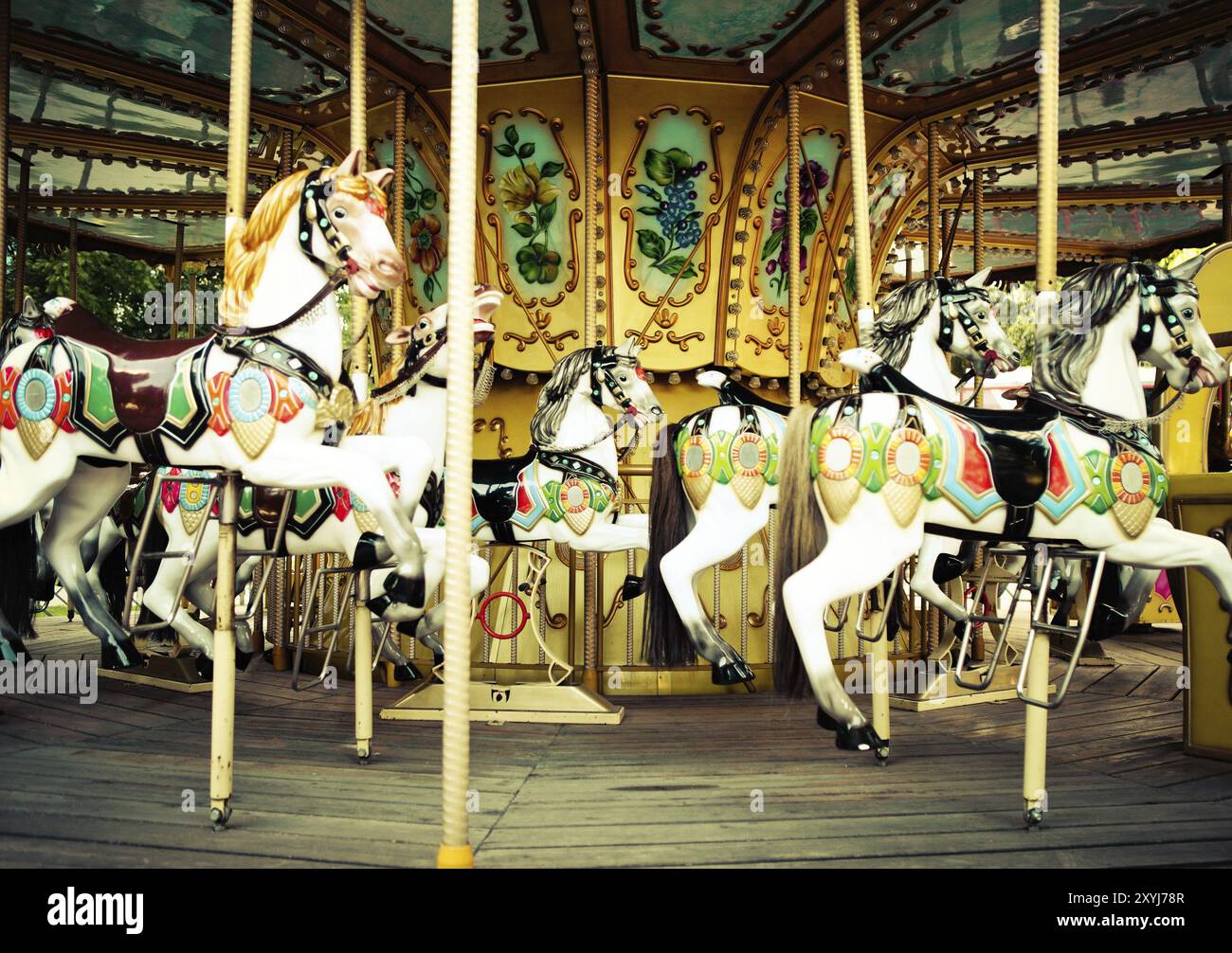 Carousel. Horses on a carnival Merry Go Round Stock Photo - Alamy