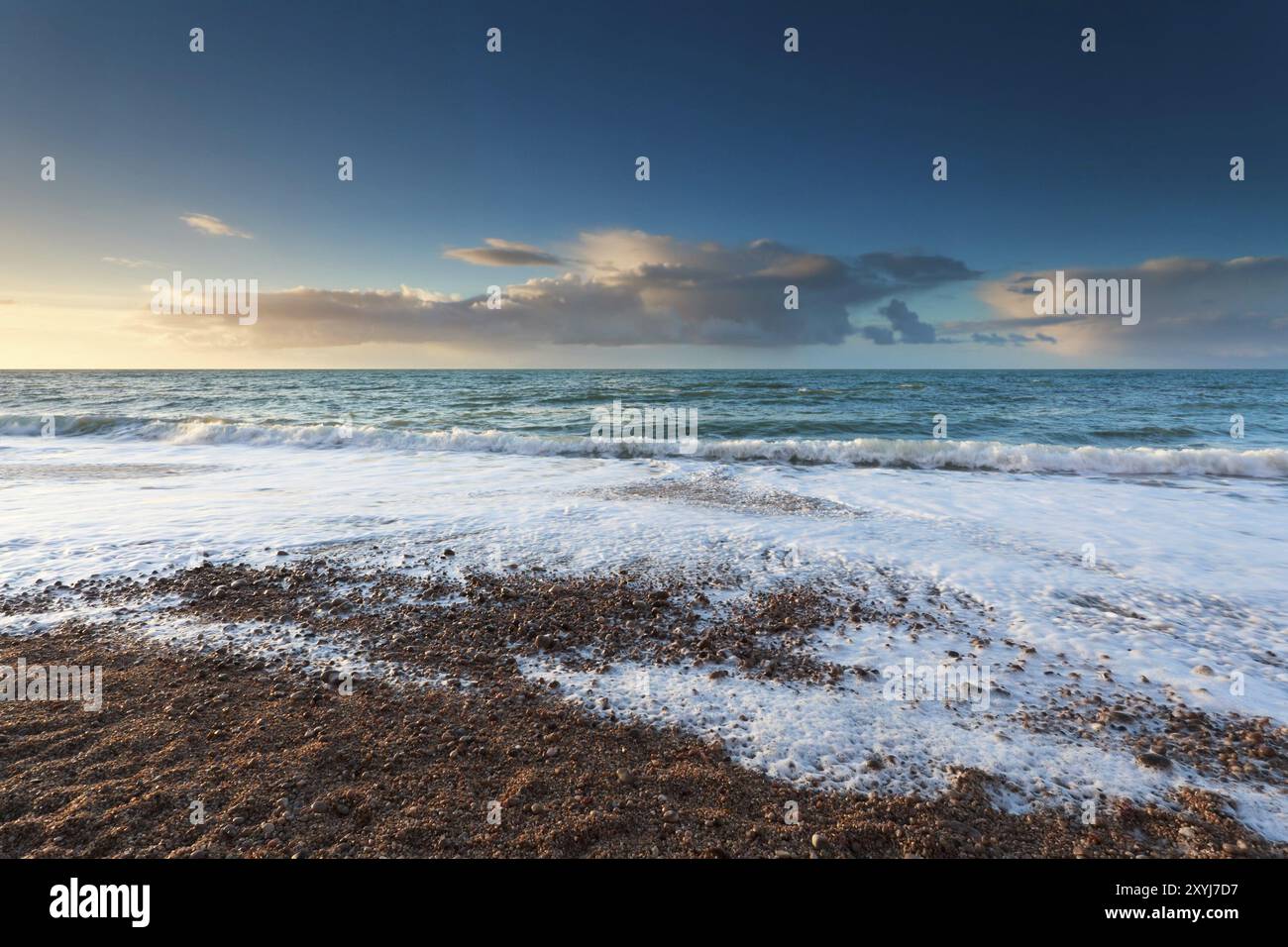Red sunsets sky over beach hi-res stock photography and images - Alamy